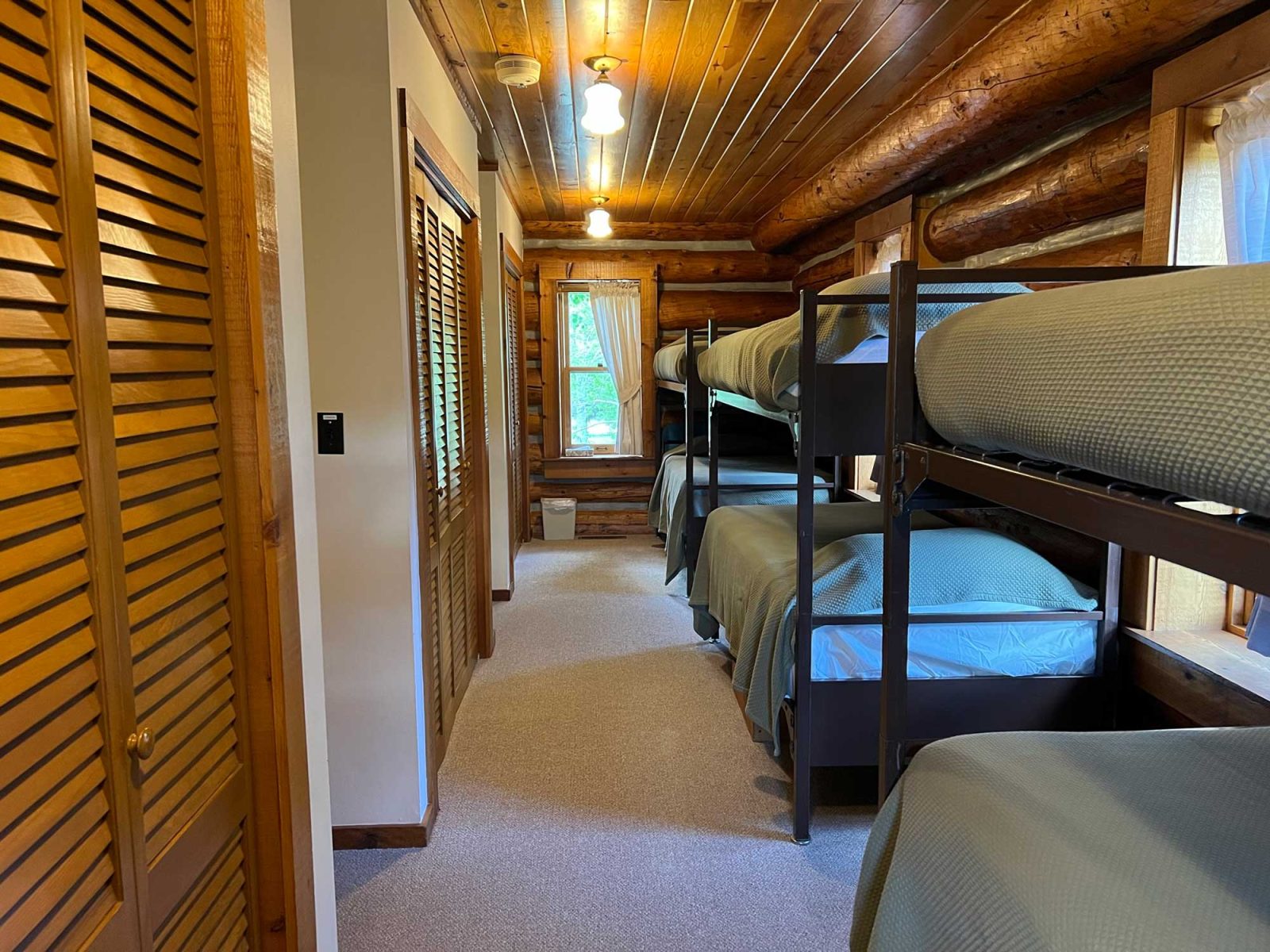 The Gunnison Women’s Dormitory - Camp Accommodations Beds - Camp Gunnison